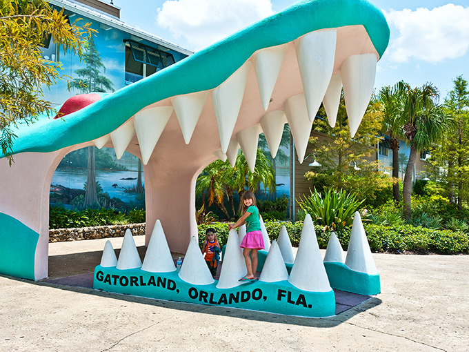 The iconic gator mouth entrance welcomes visitors with a toothy grin – Florida's version of rolling out the red carpet, just with more bite!
