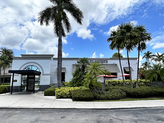 J. Alexander's welcomes hungry souls with understated Florida elegance &ndash; palm trees standing guard like culinary sentinels promising delicious adventures within.