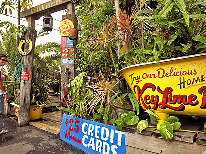Welcome to burger paradise! Le Tub's quirky entrance sets the tone with its jungle-like foliage and whimsical signage promising Key Lime delights ahead.