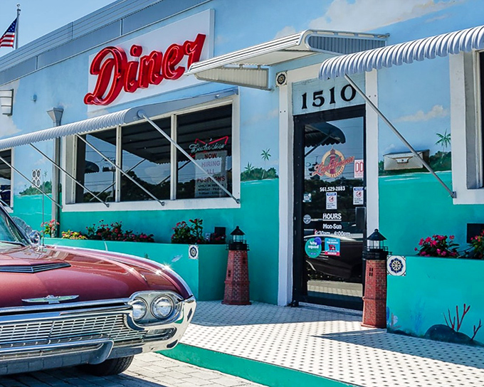 The turquoise facade of Lighthouse Diner pops against the Florida sky, with that vintage Chevy hinting at the nostalgic treasures waiting inside.