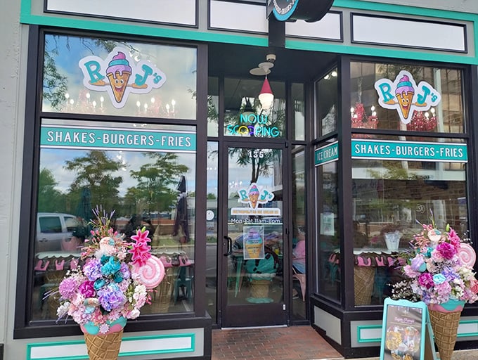 The turquoise storefront of RJ's beckons like a dessert oasis, with those whimsical floral ice cream cones promising sweet adventures within.