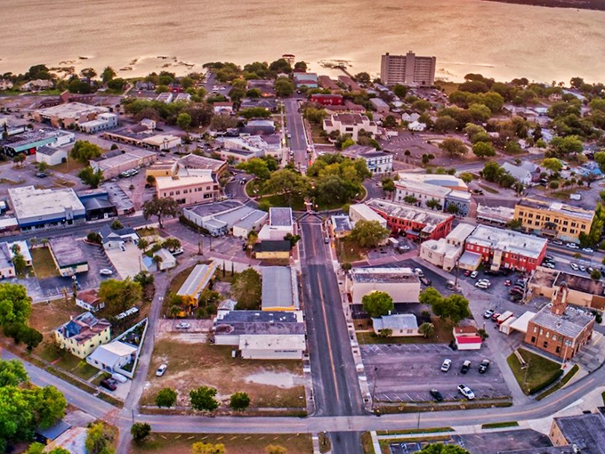 Sebring: Aerial view of this charming lakeside town where streets meet shoreline and time slows to a delicious crawl.