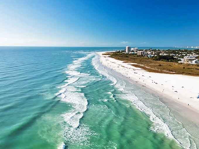 Aerial paradise: Siesta Key's famous white quartz shoreline meets the turquoise Gulf waters in a postcard-perfect Florida scene.