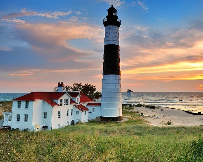 Standing tall against a sunset sky, this black-and-white striped beauty could convince anyone to quit their job and write that lighthouse romance novel.
