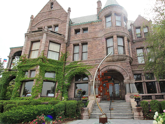 Majestic pink granite and Romanesque Revival architecture make this Detroit mansion-turned-restaurant a fairytale come to life on Woodward Avenue.