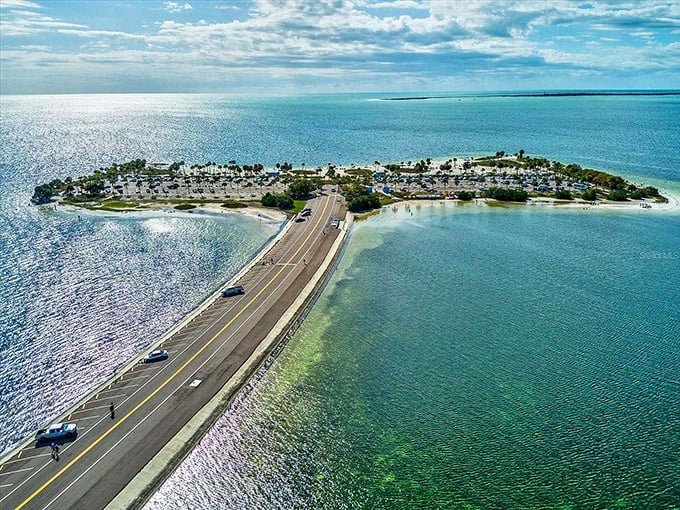 A ribbon of road cutting through turquoise waters &ndash; the Fred Howard Park Causeway invites you to leave the mainland behind.