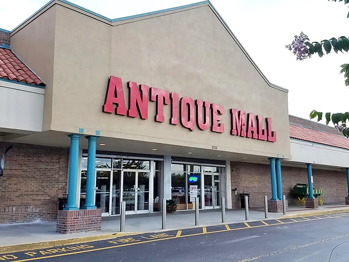 The iconic red lettering of Lakeland Antique Mall beckons treasure hunters with promises of vintage wonders within these unassuming walls.