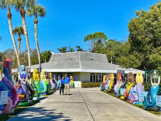 A rainbow of mermaids welcomes visitors to Brooksville's most colorful gathering, where the dress code is strictly scales and smiles.
