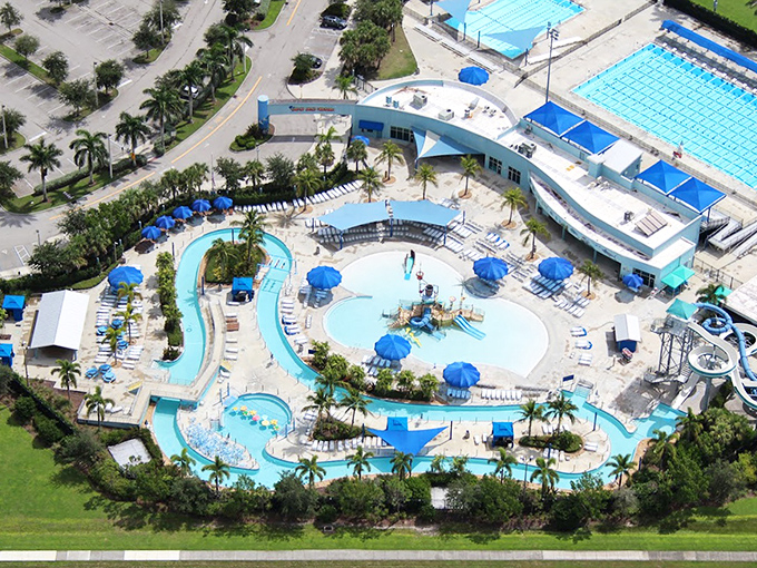 An aerial view of paradise where palm trees meet water slides and Florida families find their summer bliss.