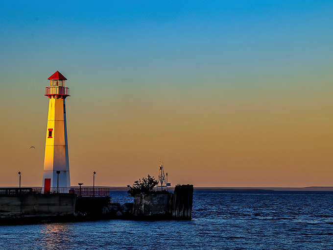 Wawatam Lighthouse: Bathed in golden sunset light, this 52-foot beacon stands like Michigan's version of a supermodel posing for its glamour shot.