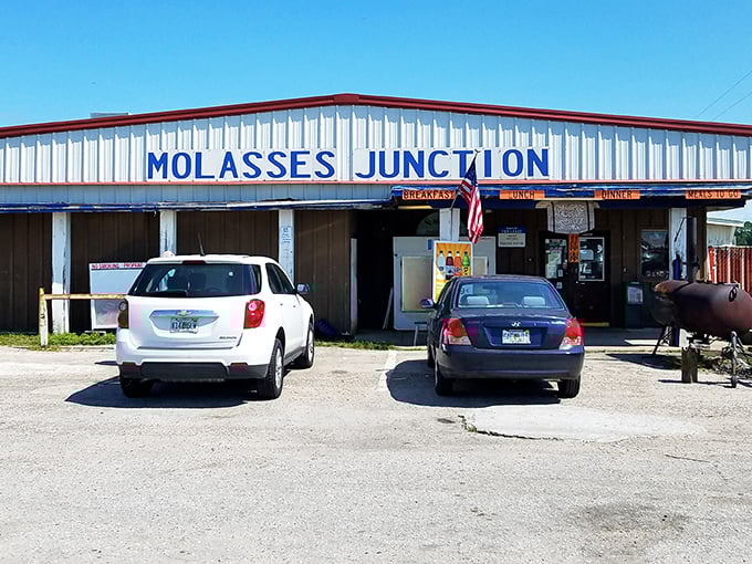 Molasses Junction welcomes hungry travelers with its no-nonsense metal exterior and bold blue signage &ndash; Florida's breakfast paradise hiding in plain sight.