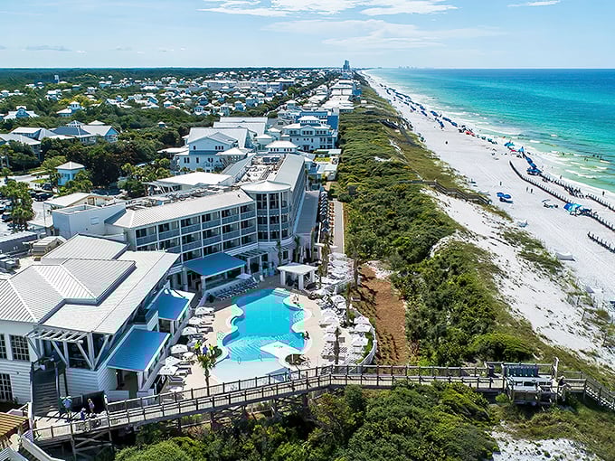 Aerial paradise: Where emerald waters meet sugar-white sands along 30A's crown jewel, creating Florida's most photogenic coastline.