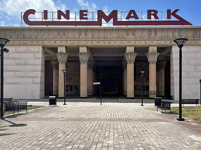 The grand Egyptian facade of Cinemark Paradise 24 stands majestically against the Florida sky, promising cinematic adventures beyond the ordinary.