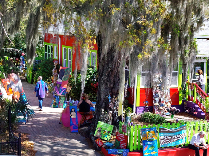 Spanish moss drapes over vibrant cottages like nature's own decorative touch &ndash; the Village's signature blend of wild and wonderful.