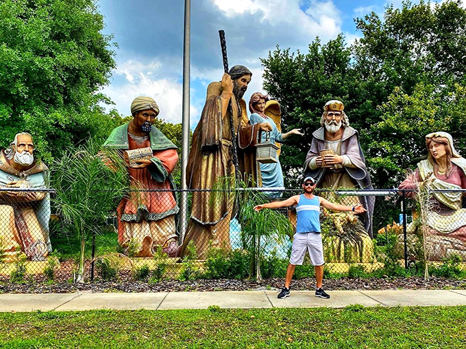 Towering biblical figures stand sentinel along the roadside, making ordinary visitors feel like spiritual Lilliputians in this extraordinary display.