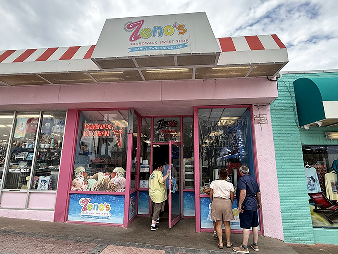 The pink facade of Zeno's stands out on Daytona Beach Boardwalk like a flamingo in a business district, promising sweet escapes since 1948.