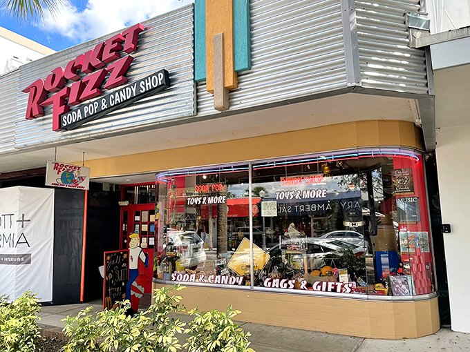 The retro silver-and-red storefront of Rocket Fizz beckons like a beacon of sweetness on Winter Park's streetscape, promising nostalgic treasures within.