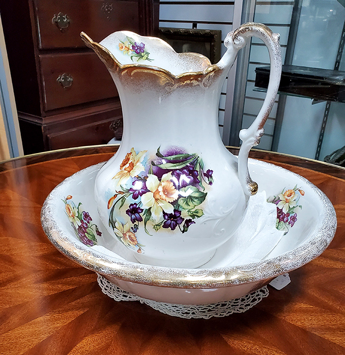 This delicate wash pitcher and basin set once performed the humble daily ritual of cleanliness with unexpected grace and beauty.