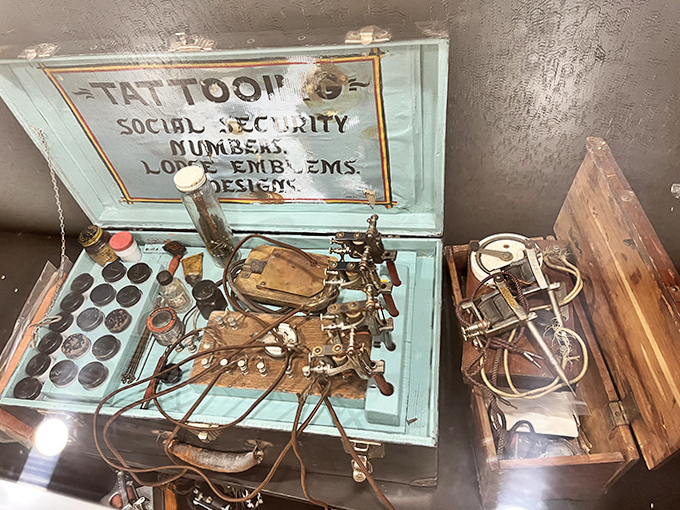 This antique tattoo kit looks more medical than artistic, a reminder of tattooing's complex history and evolution.