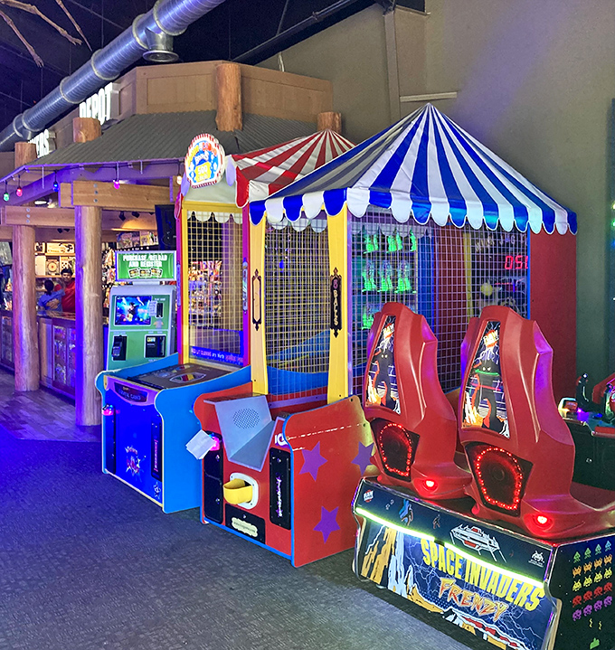 The arcade's carnival atmosphere brings gaming classics and new favorites together under a canopy of colorful lights.