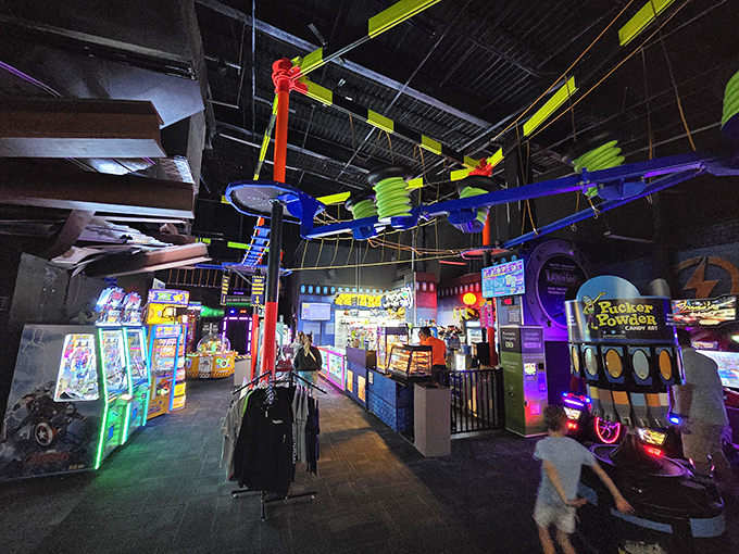 The arcade section buzzes with lights and sounds, offering games that test reflexes while emptying pockets faster than a pickpocket convention.