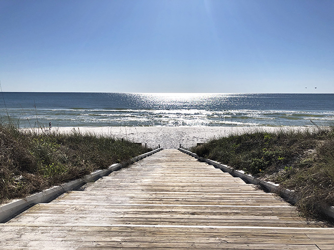 This wooden boardwalk doesn't just lead to the beach &ndash; it's practically a runway for your grand entrance to the Gulf's emerald waters.