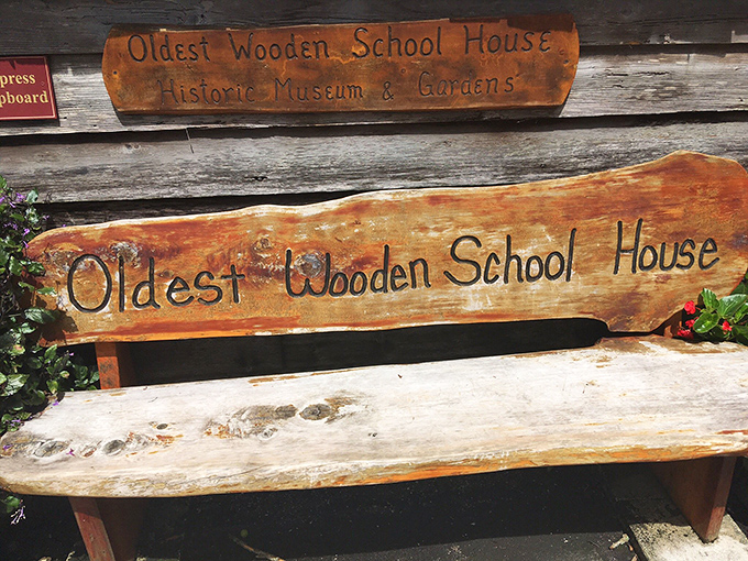 Even the benches tell stories here, with hand-carved lettering commemorating the schoolhouse's unique place in American educational history.