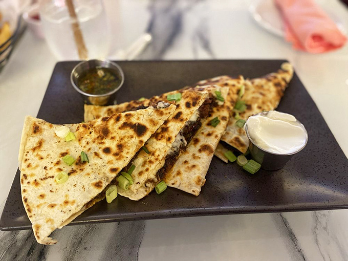Quesadillas emerge golden and crisp, with cheese stretching into Instagram-worthy pulls &ndash; savory engineering at its finest.