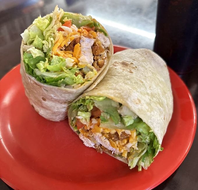 The Buffalo Chicken Wrap—portable perfection that somehow manages to contain delicious chaos within a single tortilla.