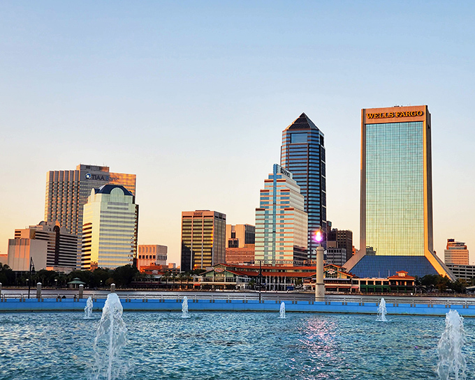 Jacksonville's distinctive skyline frames the fountain perfectly, creating a postcard-worthy vista that captures the city's riverfront charm.