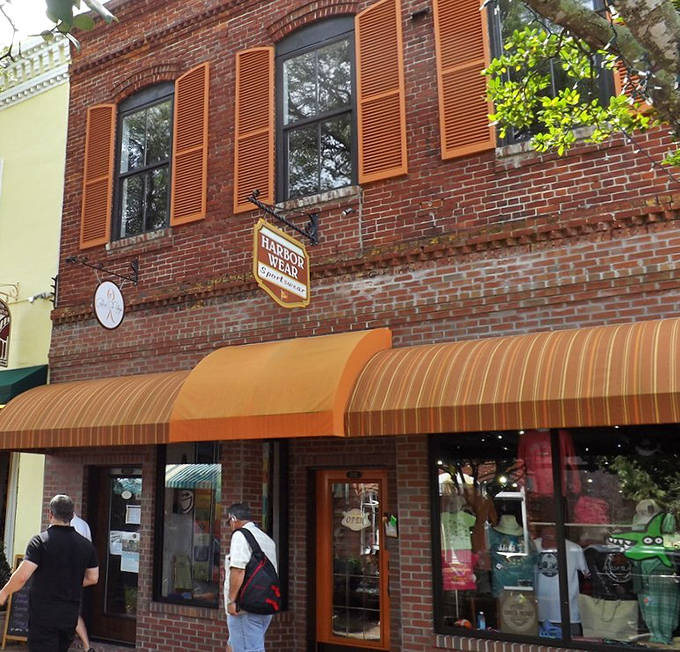 Harbor View Trading's brick facade and striped awning promise treasures inside that no online shopping cart could ever contain.