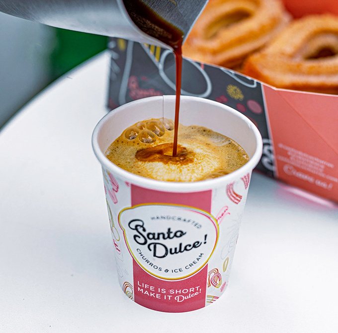 Hot coffee meets sweet churro in this cup of contrasts, where the churro slowly soaks up coffee flavor like a delicious sponge.