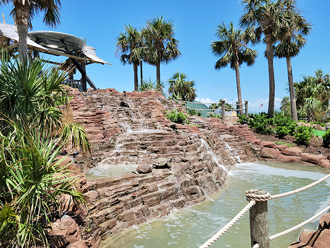 Congo River Golf: A tropical waterfall creates the perfect backdrop for putting adventures. Palm trees sway as if welcoming visitors to this mini-golf paradise.