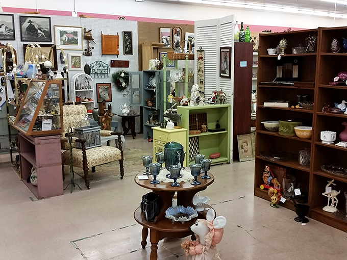 Vintage treasures arranged with loving care create cozy corners throughout the mall, each display telling a story of American domestic life.