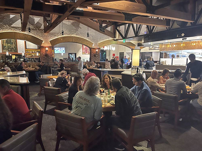 The dining room hums with the perfect soundtrack &ndash; conversation, laughter, and the occasional gasp of delight as plates arrive at neighboring tables.