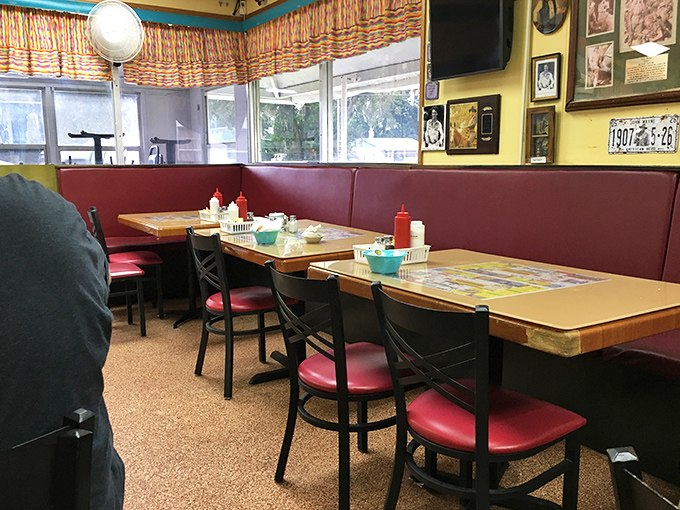 Red vinyl booths line the walls beneath a gallery of western memorabilia&mdash;John Wayne silently approves of your country fried steak from multiple angles.