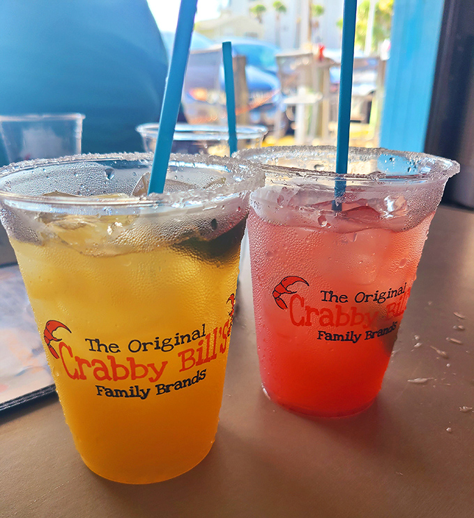 Colorful drinks in souvenir cups &ndash; they're cold, they're strong, and they taste like vacation in liquid form.