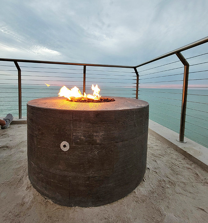 As day turns to dusk, the oceanfront fire pit becomes prime real estate for sunset cocktails and whispered vacation plans.