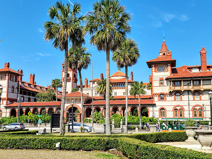 Flagler College's courtyard blooms with tropical splendor, where Spanish Renaissance architecture creates a campus that makes Harvard look like it's not even trying.