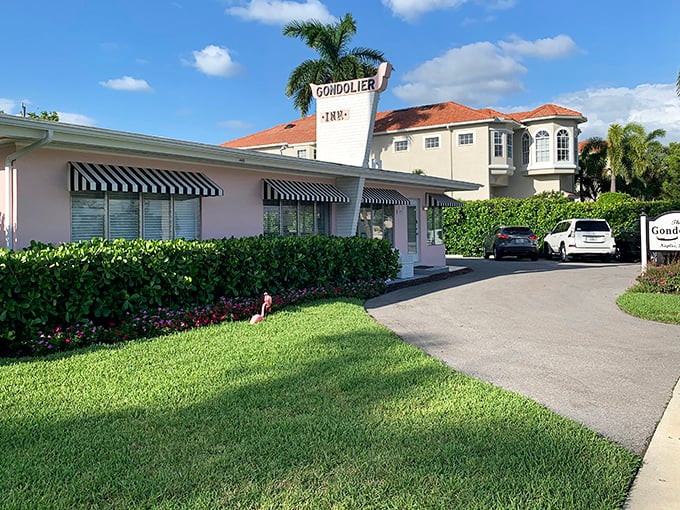 The Gondolier Inn's charming pink exterior and classic awnings have welcomed diners seeking authentic Italian cuisine for generations.