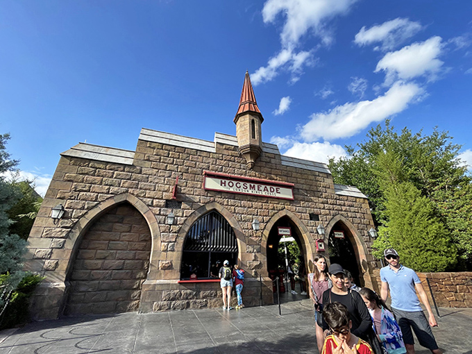 Hogsmeade Station's stone facade welcomes visitors to the snow-capped village, complete with that unmistakable wizarding world charm.