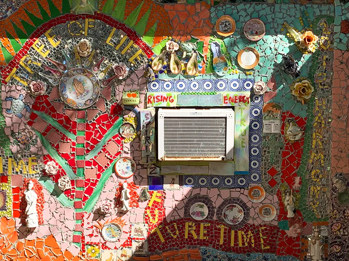 This isn't just a wall &ndash; it's a visual feast of mosaic art with embedded messages that reveal themselves to patient observers.