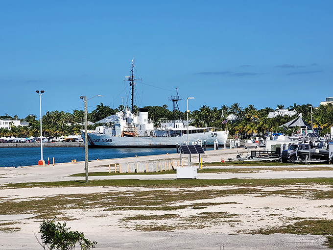 Near dock area: This retired Coast Guard cutter stands sentinel, a steel guardian watching over waters it once patrolled.