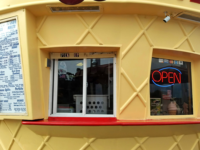 The order window glows with promise, a portal to frozen happiness where friendly staff transform simple ingredients into edible joy for eager customers.