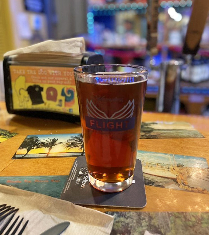 Nothing complements smoky barbecue like a local craft beer, served in a proper glass because Yellow Dog Eats respects both the brew and your barbecue experience.