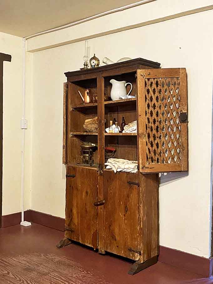 This weathered wooden cabinet stored the precious herbs and tools of the hospital apothecary – medicine's primitive pharmacy department.