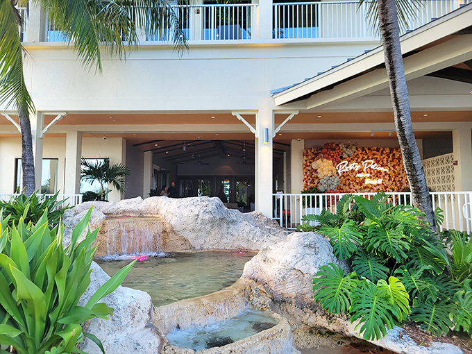 Rusty Pelican's entrance fountain creates the perfect tropical welcome, promising seafood fresh enough to need introduction.