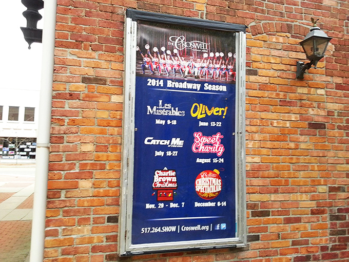 A season poster proudly displays Broadway-caliber productions, from Les Misérables to Oliver!, showcasing the theater's ambitious programming.