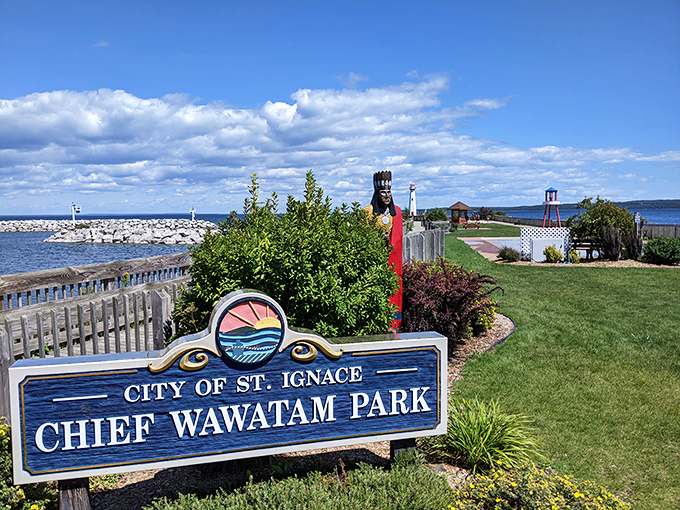 Chief Wawatam Park welcomes visitors with its blue sign, standing guard like a friendly usher to this waterfront theater of natural beauty.