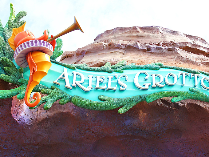 The iconic Ariel's Grotto sign, where countless childhood dreams have come true and adult nostalgia runs deeper than the ocean.